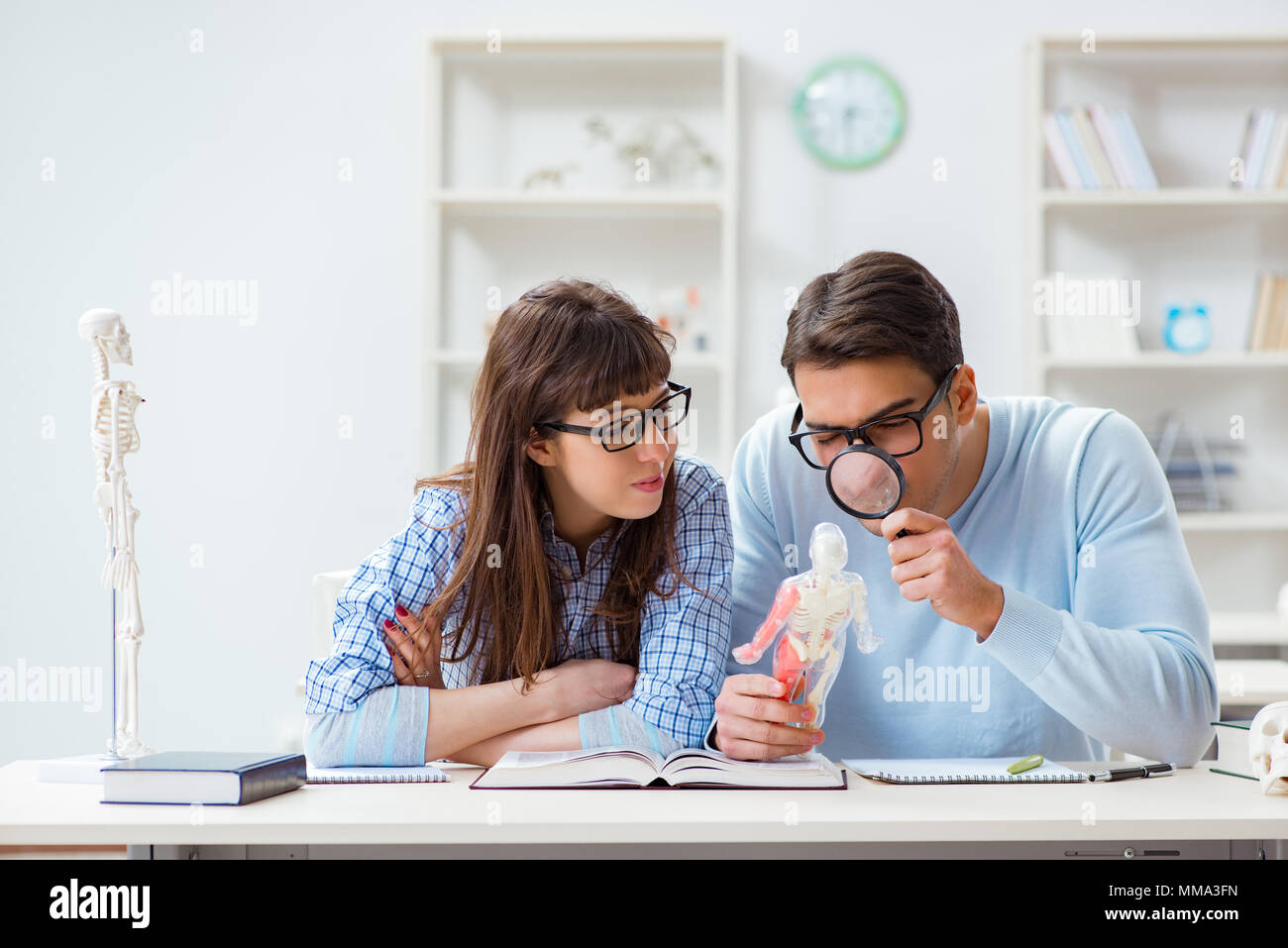 Two medical students studying in classroom Stock Photo - Alamy