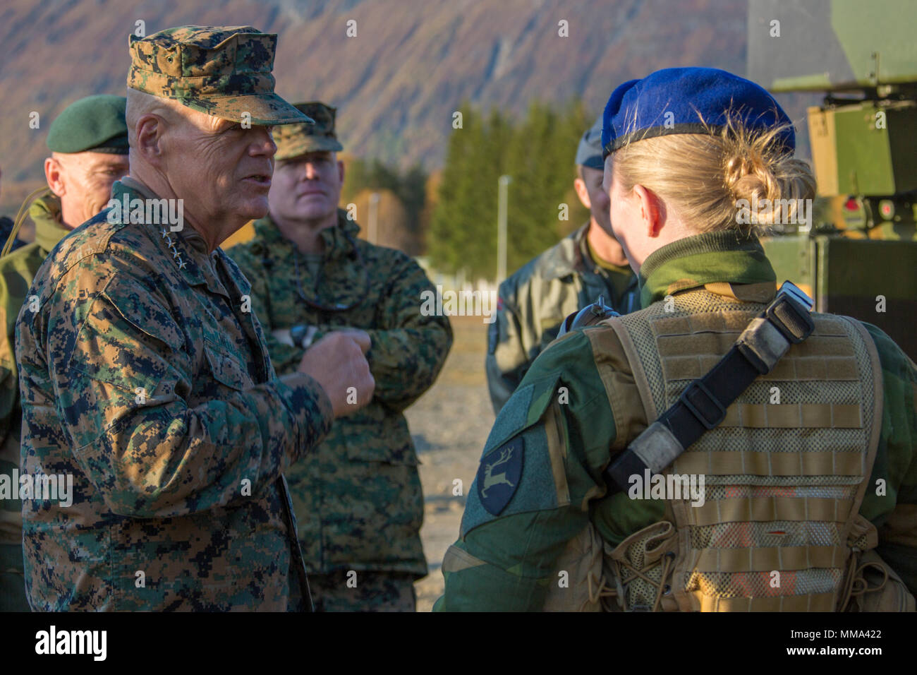 Commandant of the Marine Corps Gen. Robert B. Neller, left, speaks with ...