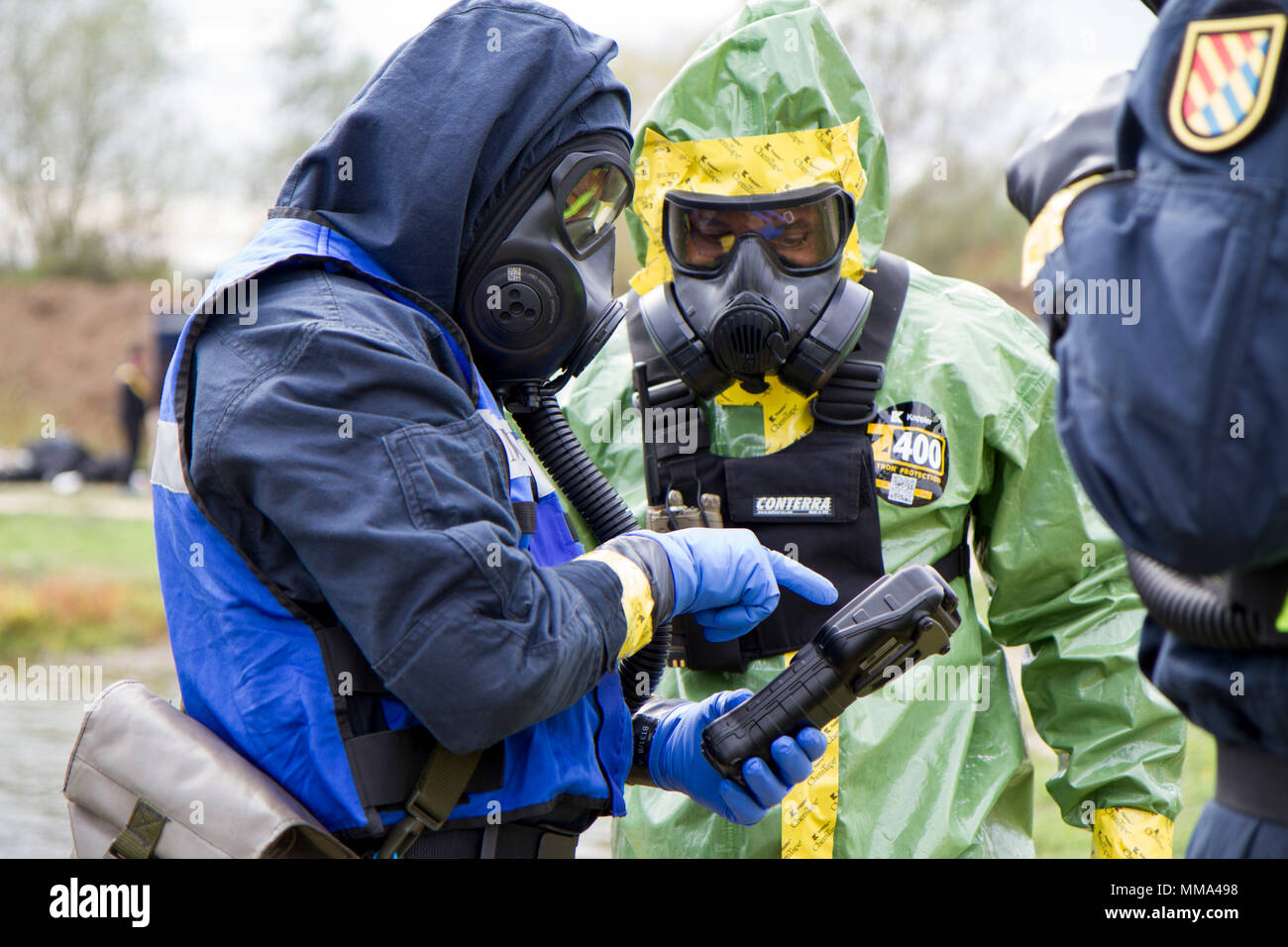 Staff Sgt. Patrick McNeely (right), chemical, biological, radiological ...