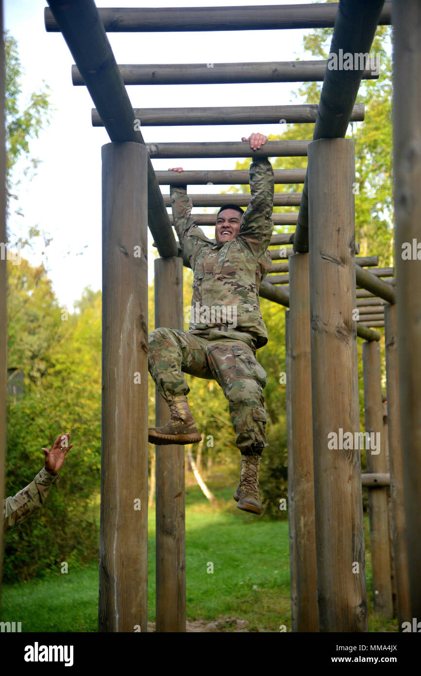 SGT Susi Stuttgart Army Medical Clinic negotiates the Tarzan obstacle ...