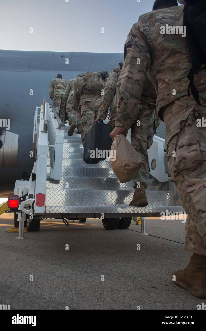 U.S. Soldiers assigned to the 101st Combat Aviation Brigade (CAB) board ...