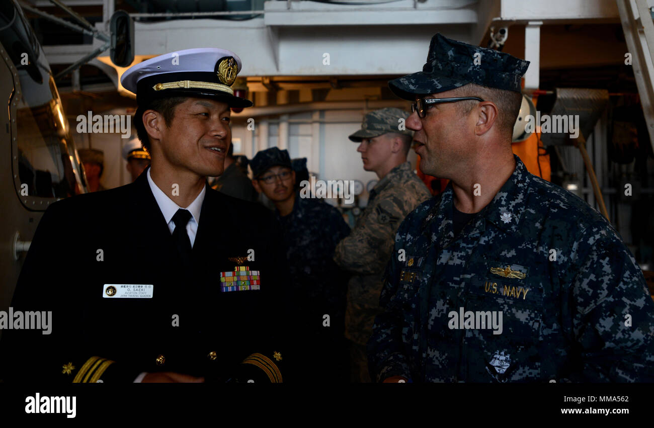 U.S. Navy Cmdr. Michael Kenney, commanding officer of Navy Operation ...