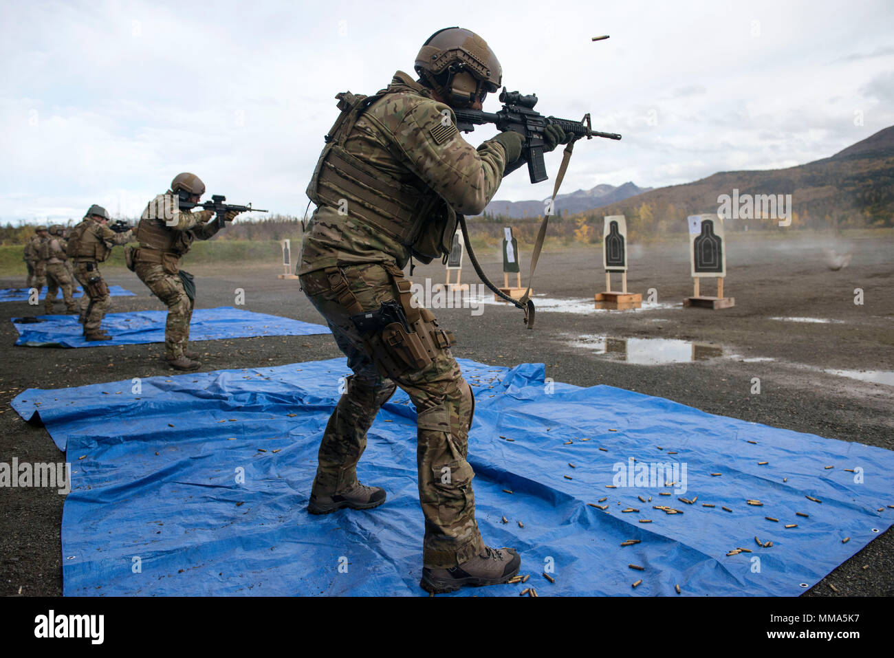 Airmen assigned to the 3rd Air Support Operations Squadron fire M4 ...