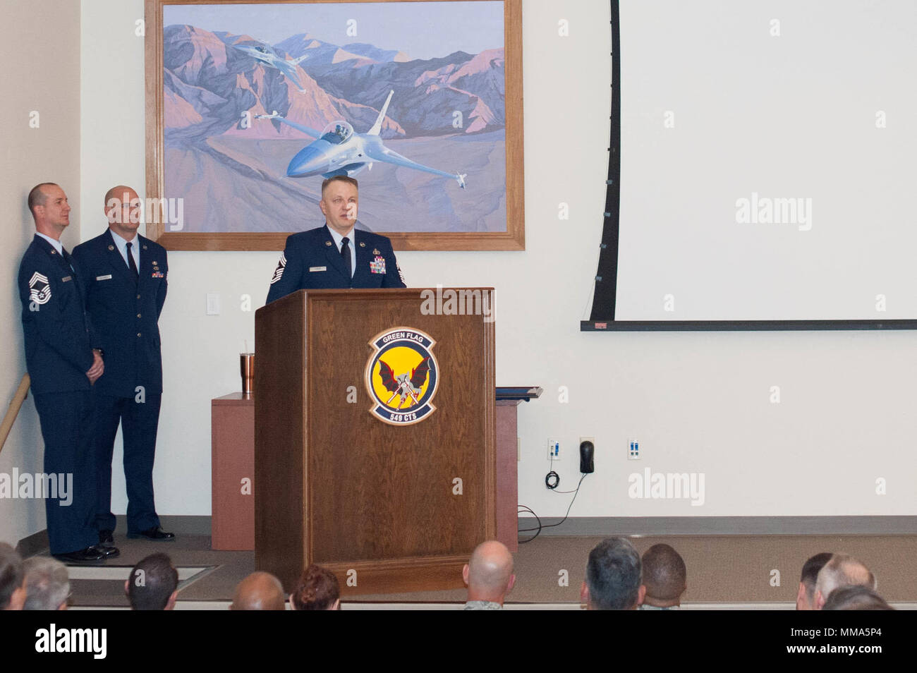 Chief Master Sgt. James Loper addresses the audience at the Assumption ...