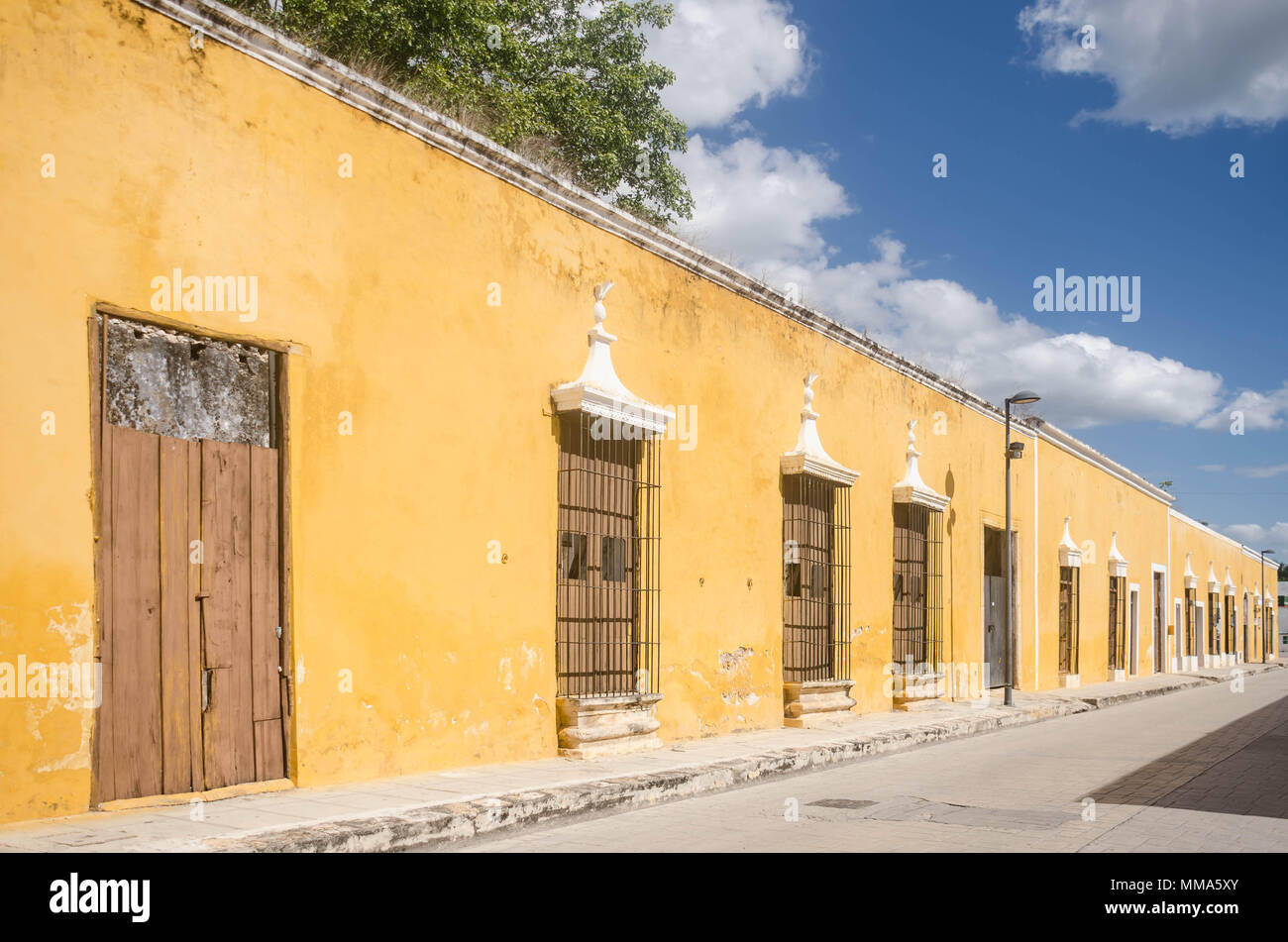 Colonial town painted with the colors of the Vatican, yellow and white ...