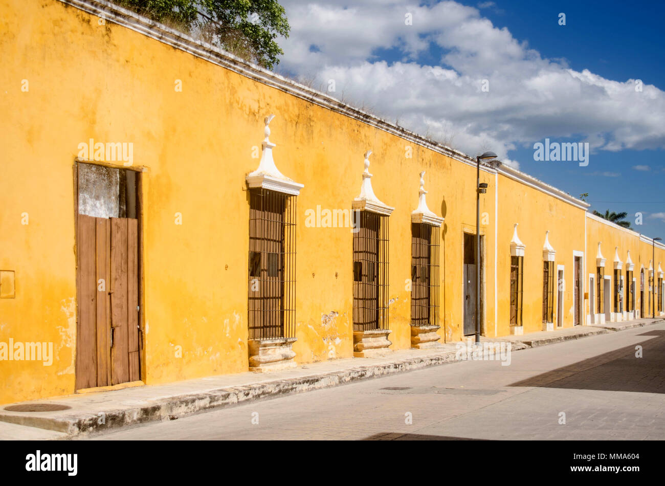 Colonial town painted with the colors of the Vatican, yellow and white ...
