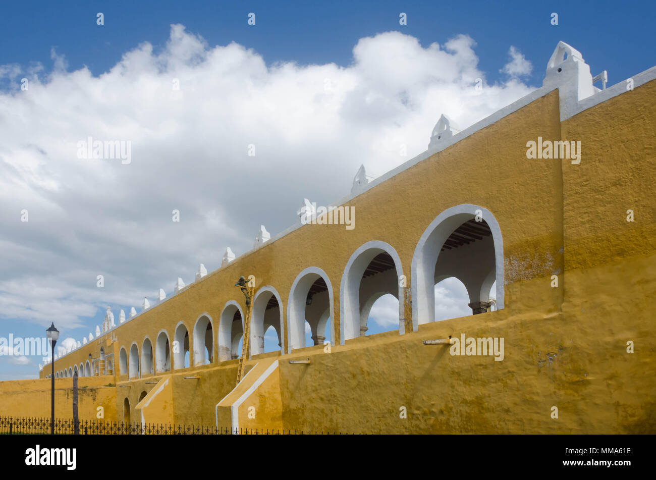 Colonial building painted with the Vatican colors of yellow and white ...