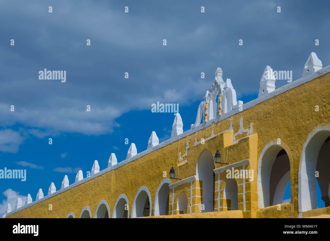 Colonial building painted with the Vatican colors of yellow and white ...