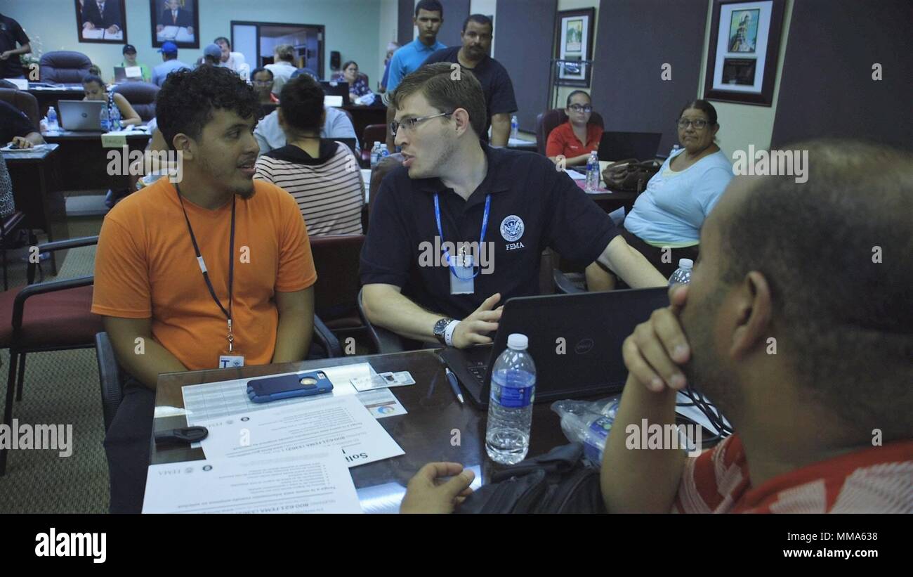 JUNCOS, Puerto Rico, Sept. 29, 2017 - Residents of Puerto Rico meet ...
