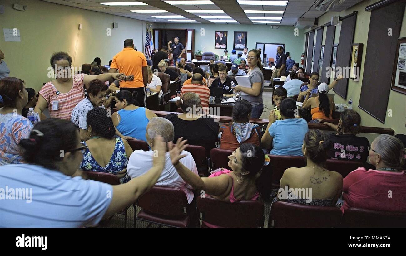JUNCOS, Puerto Rico, Sept. 29, 2017 - Residents of Puerto Rico meet ...