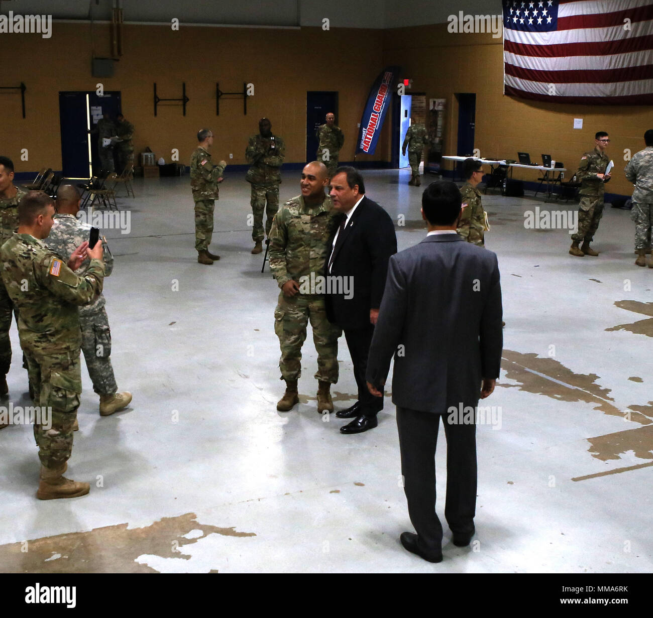 New Jersey Gov. Chris Christie greets Puerto Rico-bound New Jersey Army National Guard Soldiers ...
