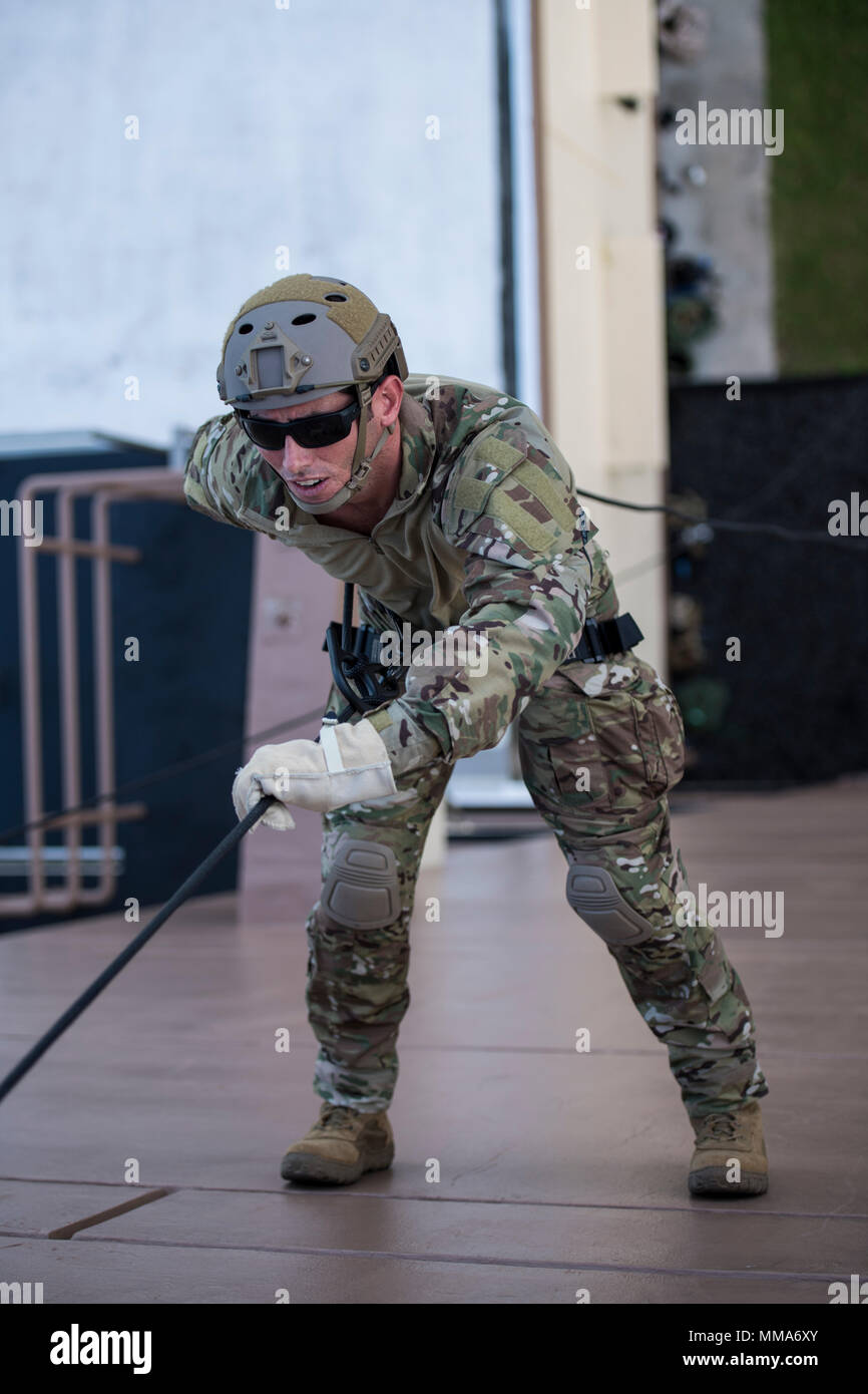 Explosive Ordnance Disposal Technician 2nd Class Cliff Lomax, assigned ...