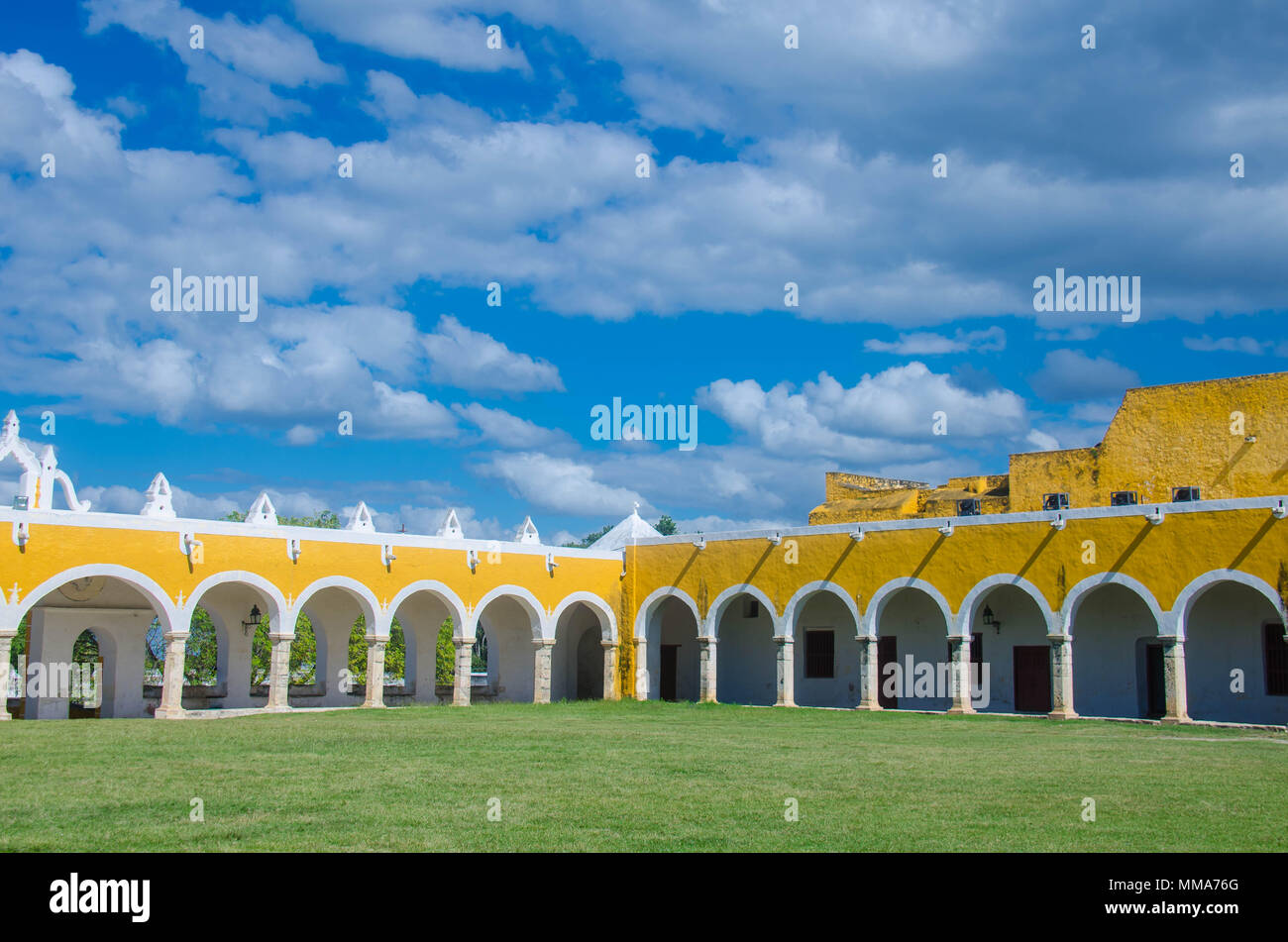 Colonial building painted with the Vatican colors of yellow and white ...