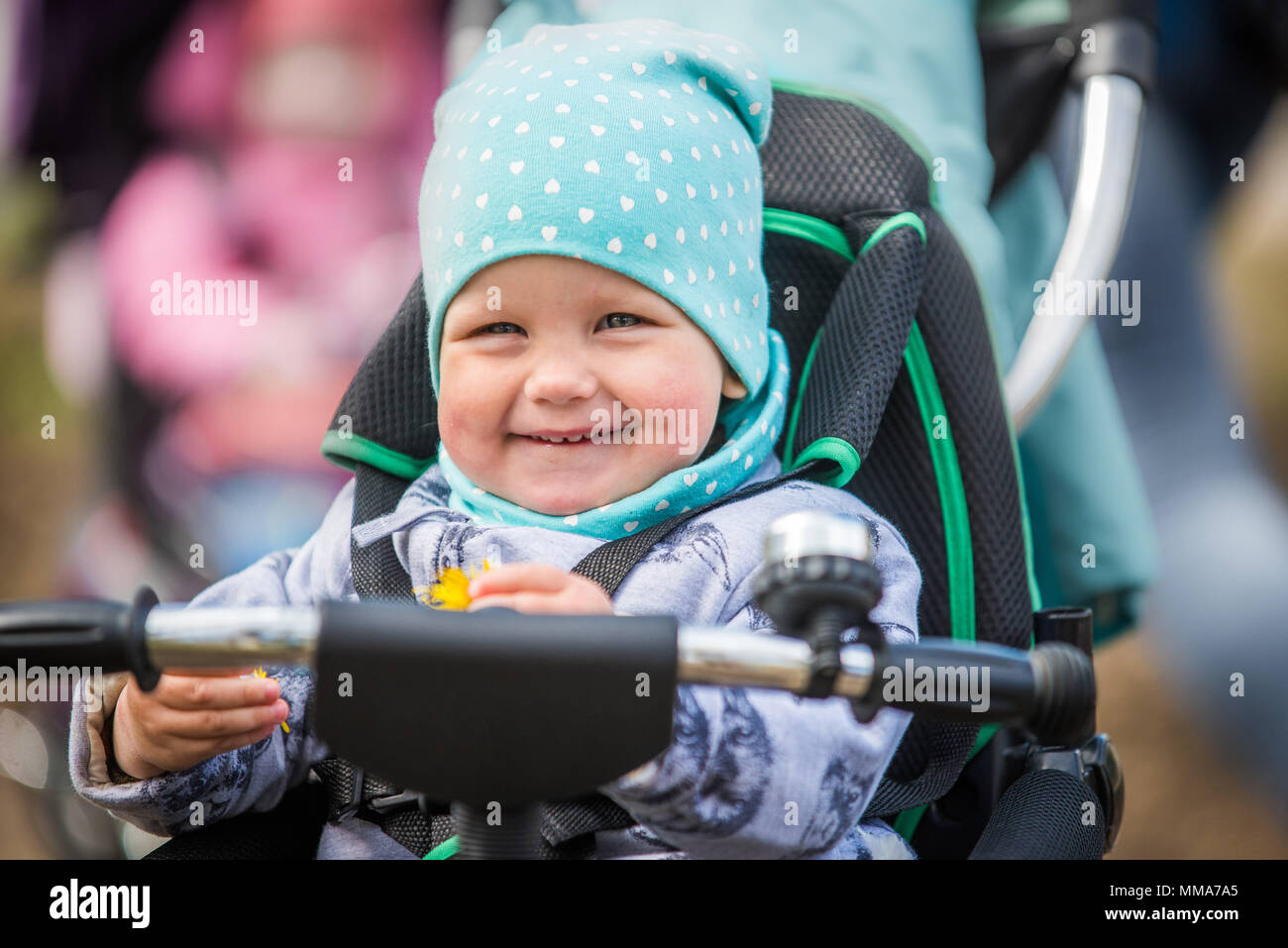 Happy cute girl riding tricycle hi-res stock photography and images - Alamy