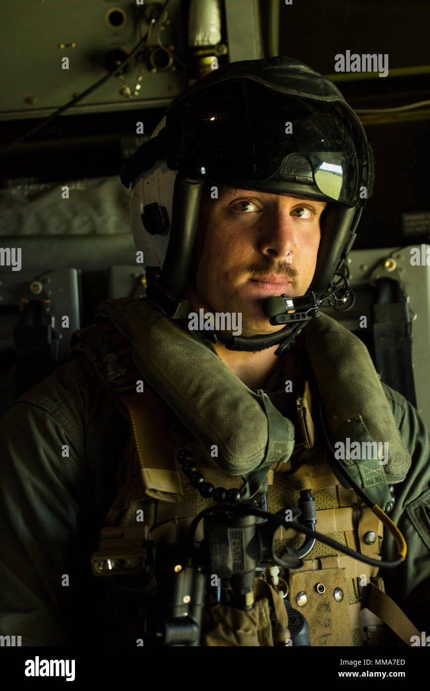 A U.S. Marine Corps crew chief assigned to Special Purpose Marine Air ...