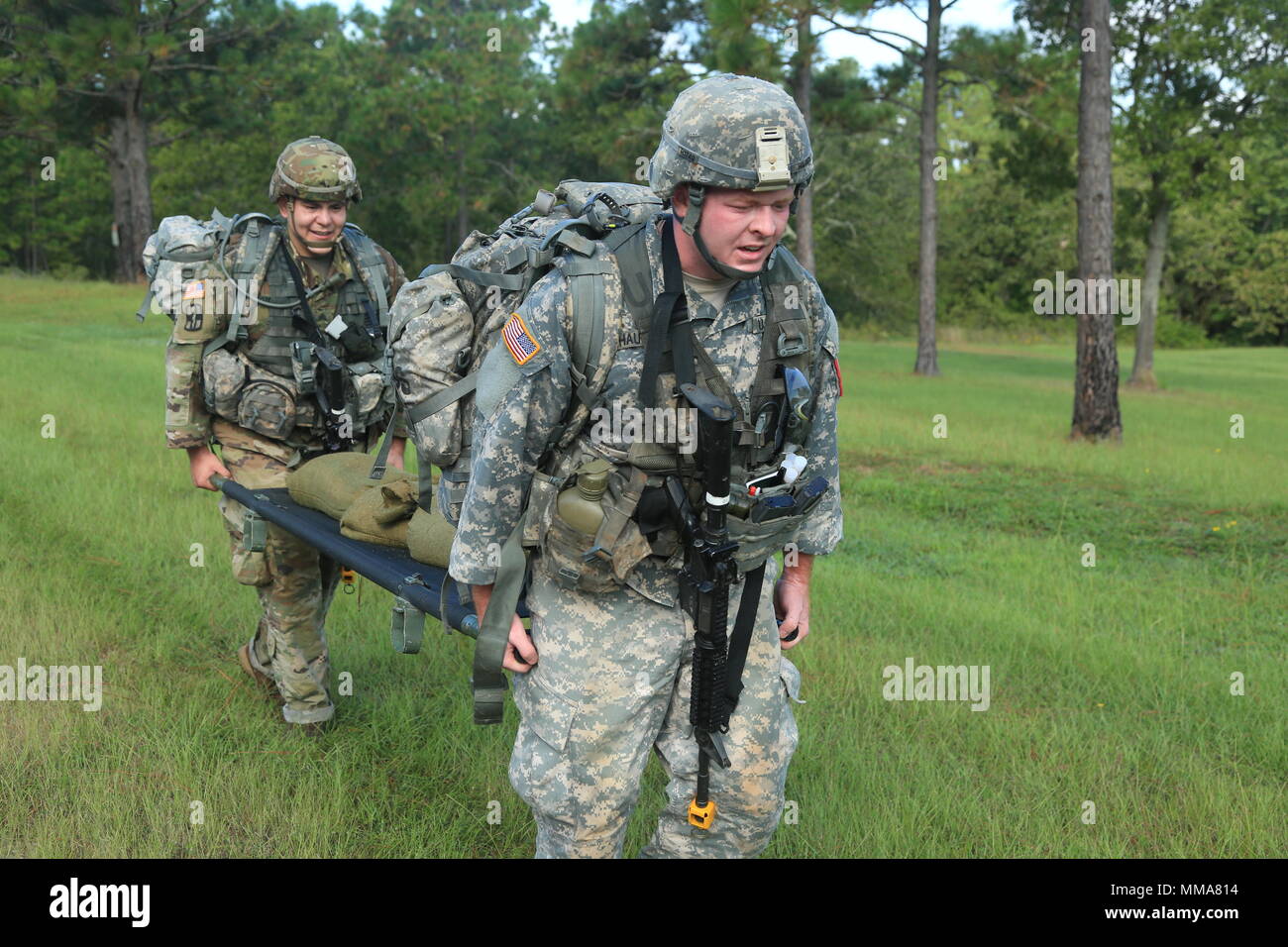 U.S. Army Sgt. David Hauger and Sgt. Christian Ozorio, both assigned to ...
