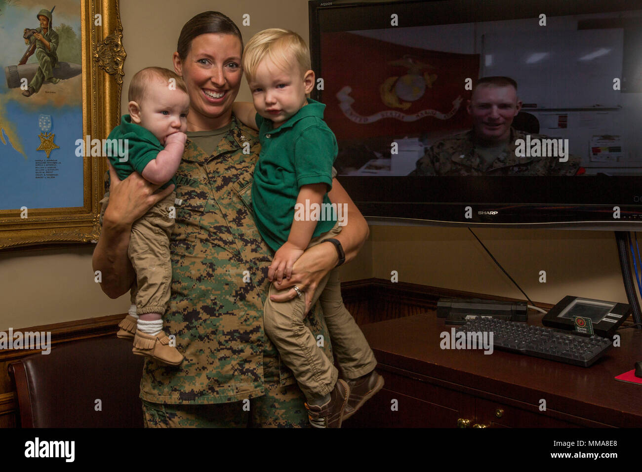 U.S. Marine Corps Lt. Col. Sarah B. Lenz poses with her family ...