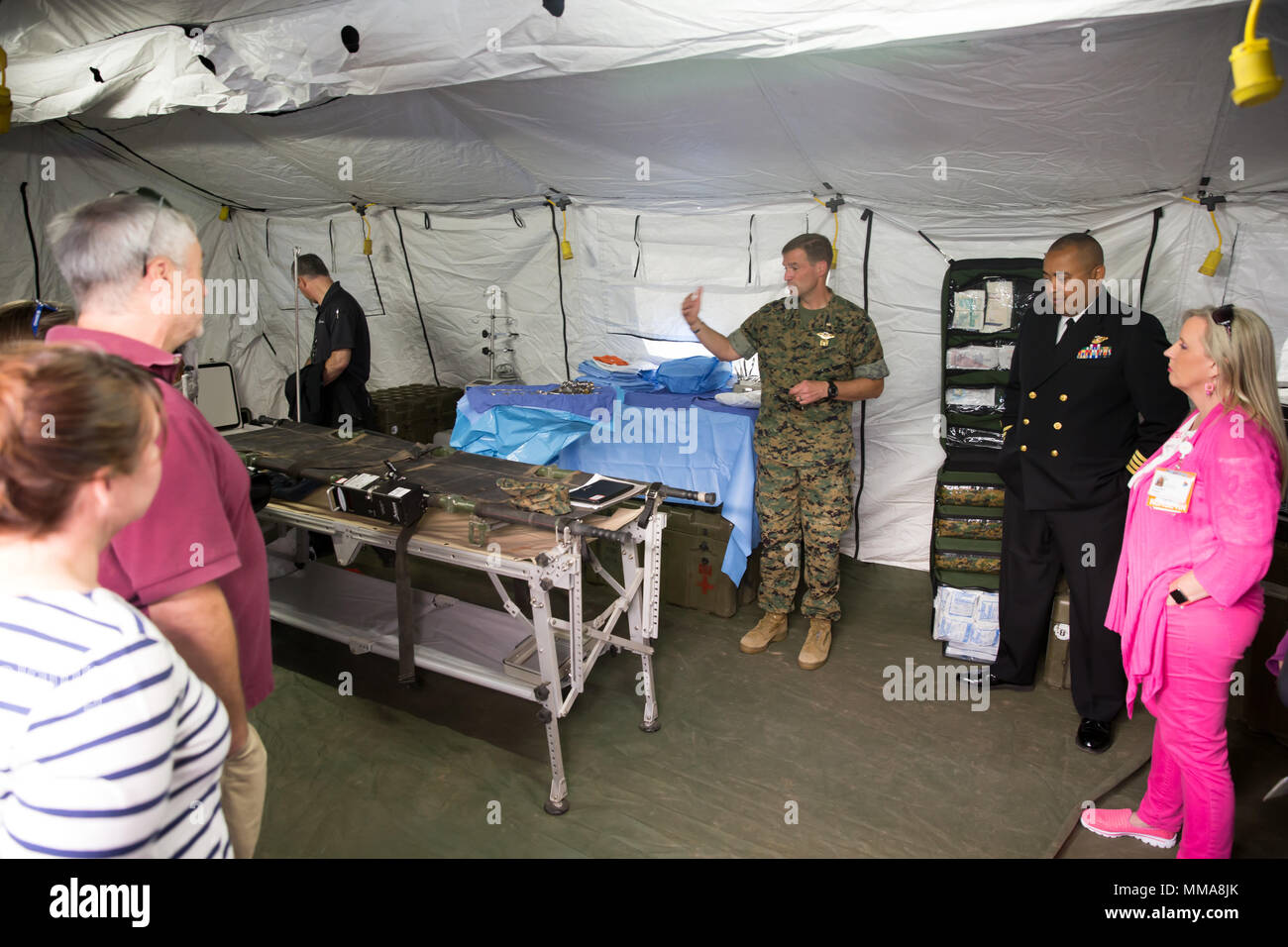 U.S. Navy Capt. Ted Edson, surgeon, 1st Medical Battalion, talks to ...