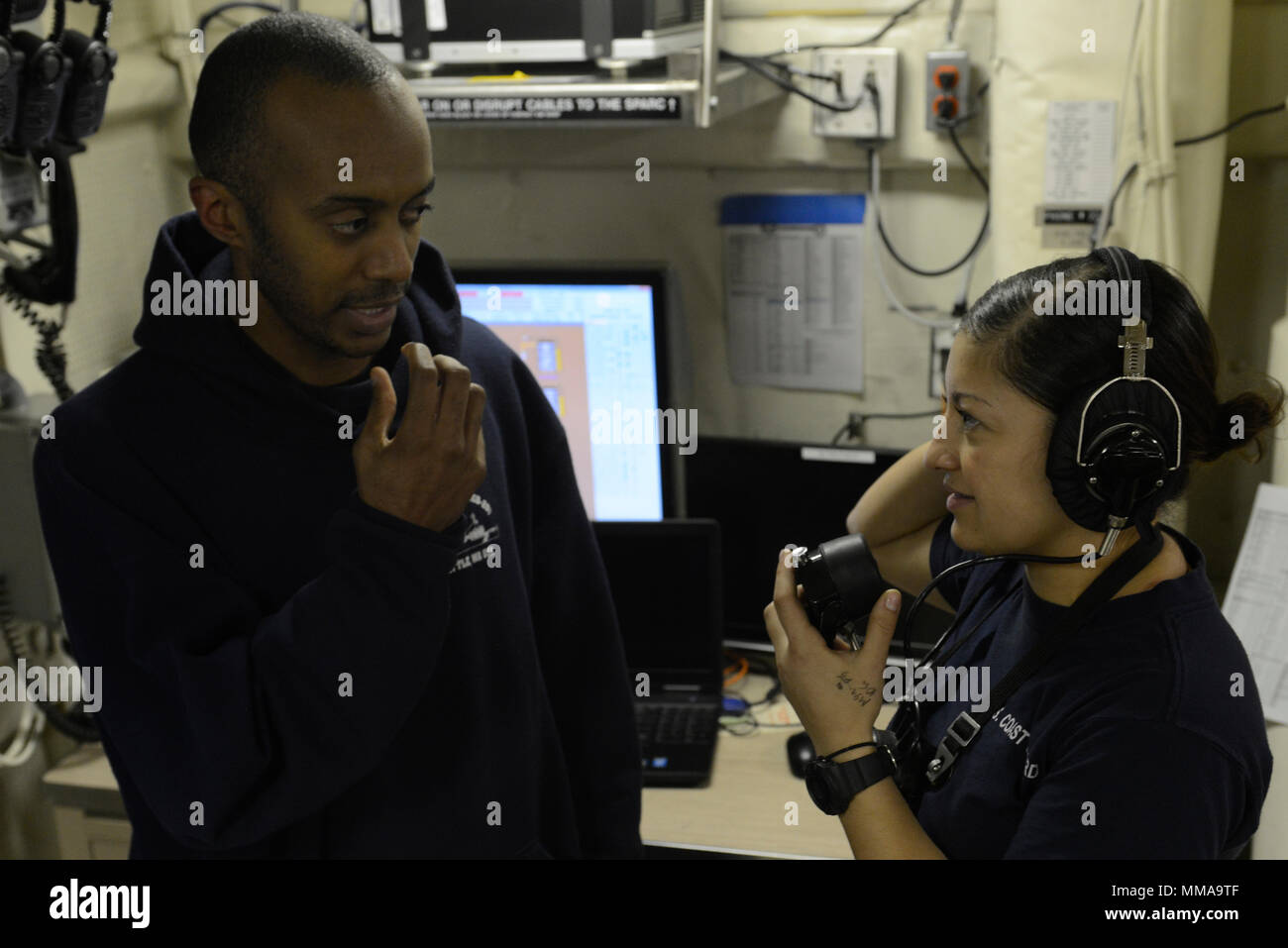 Coast Guard Petty Officer 2nd Class Stephan Daniels instructs Coast ...
