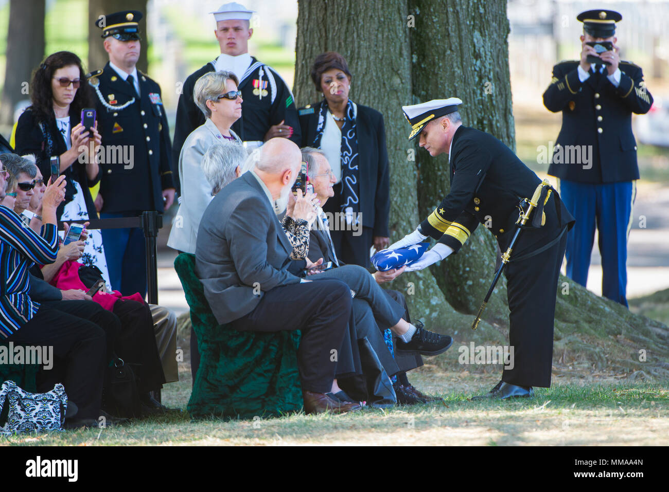 Don Rogers receives the flag at his brother's, U.S. Navy Fireman 1st ...