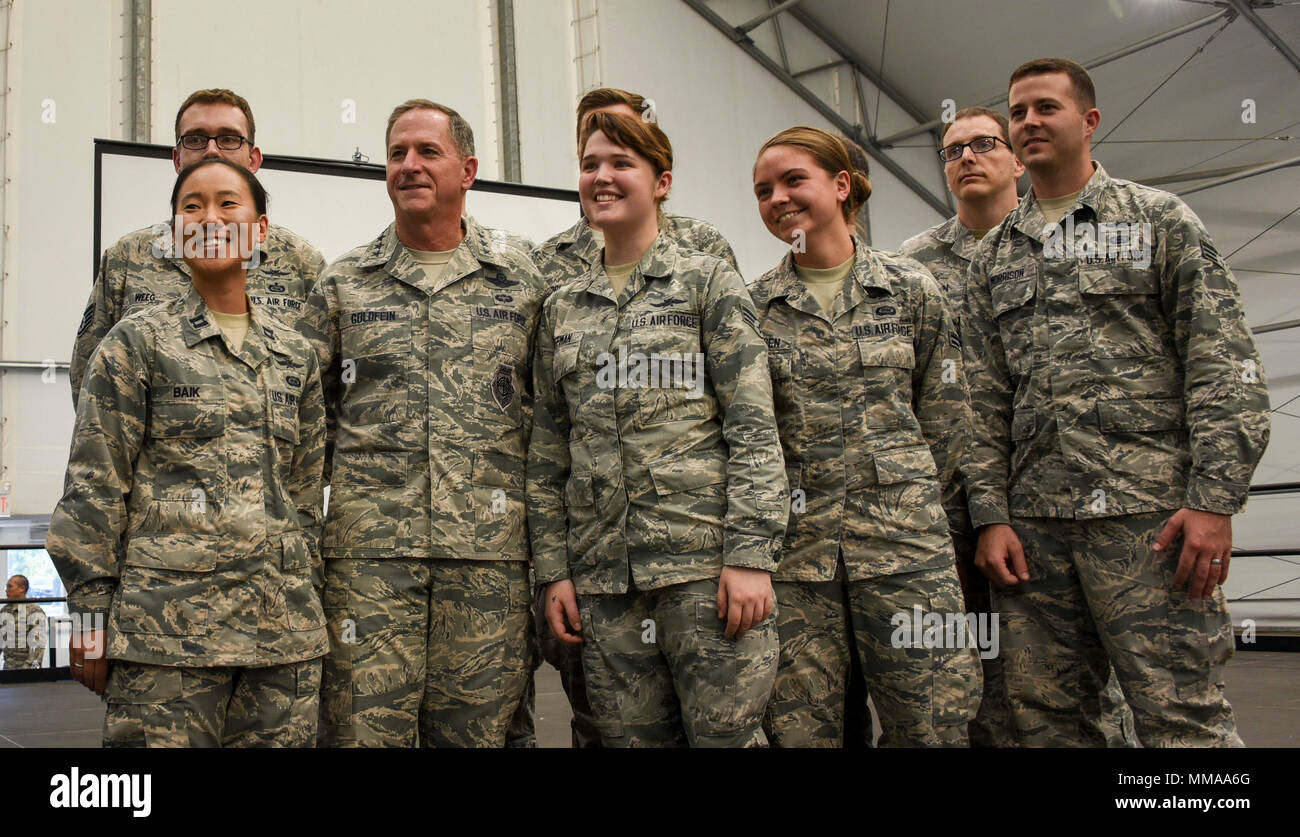 Air Force Chief of Staff Gen. David L. Goldfein poses with a group of ...