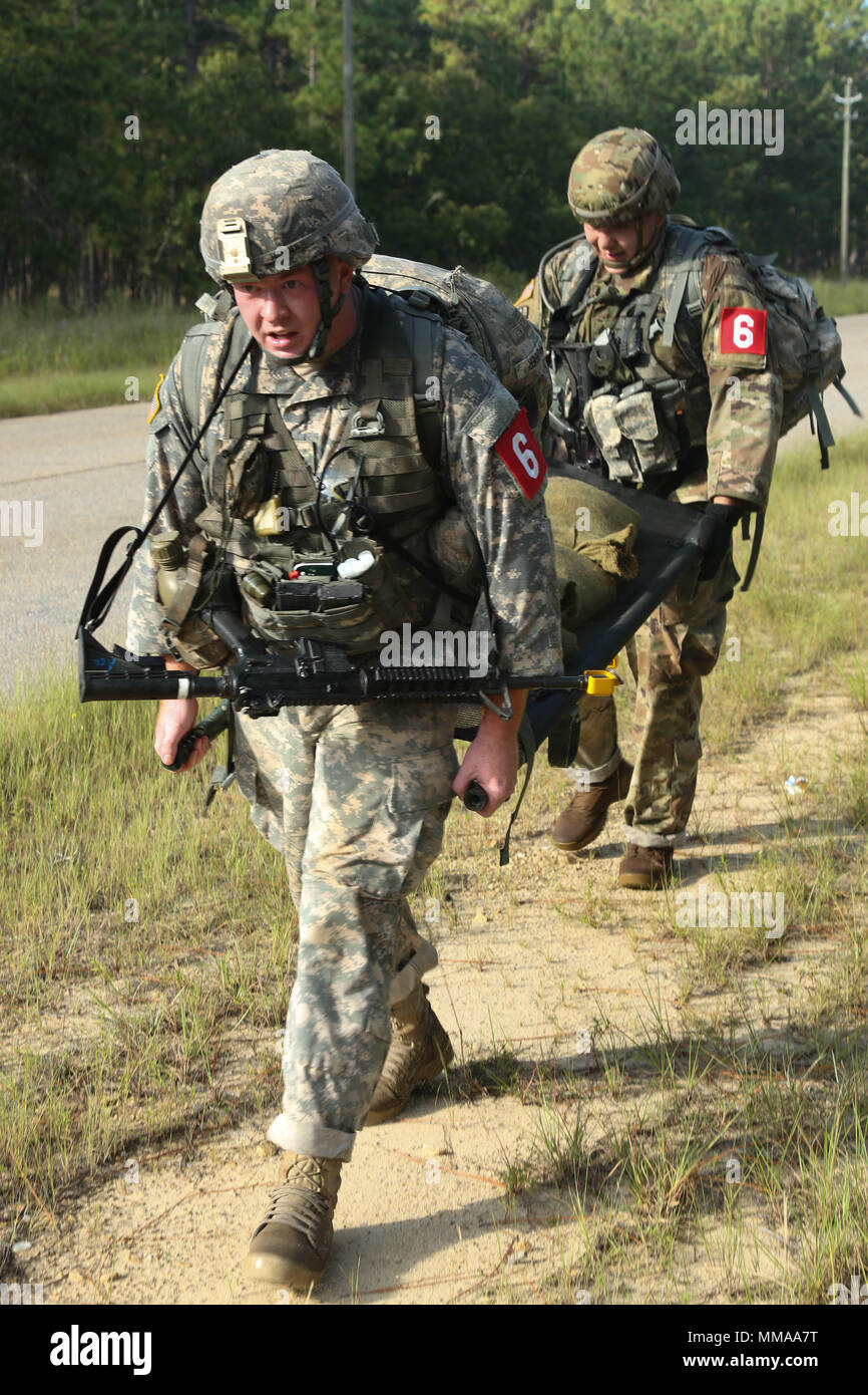 U.S. Army Sgt. David Hauger and Sgt. Christian Ozorio, assigned to the ...