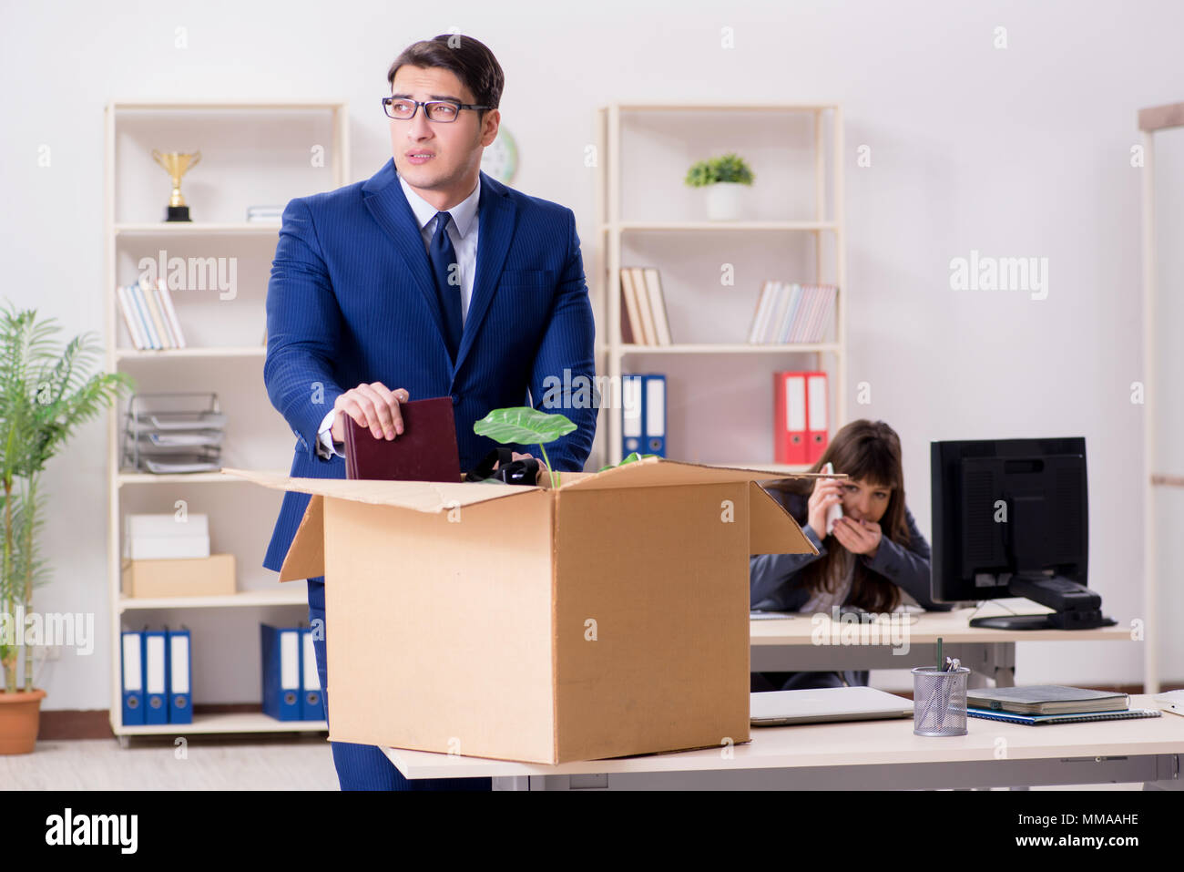 Person being fired from his work Stock Photo - Alamy