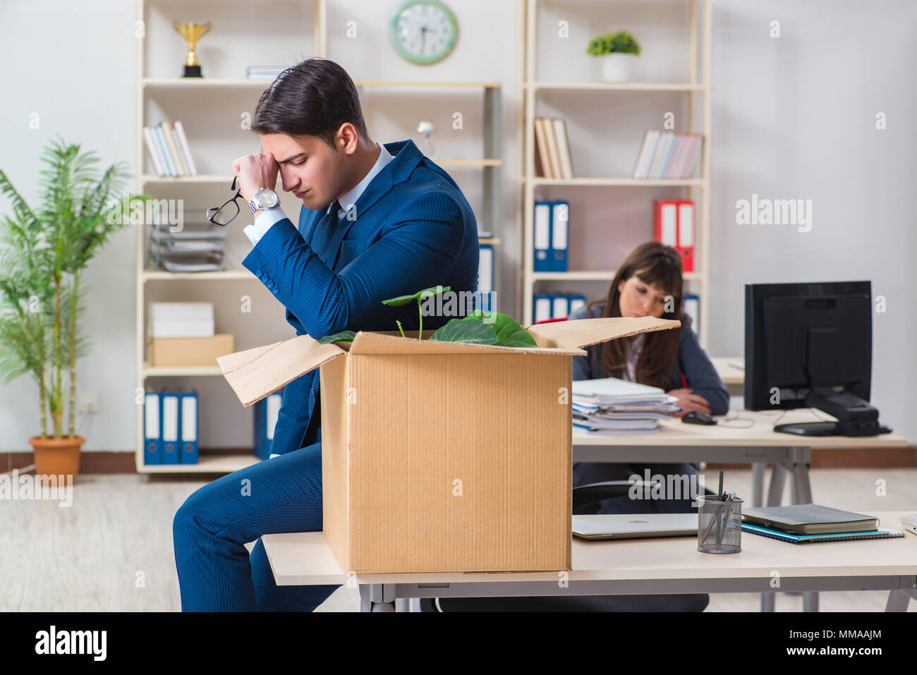 Person being fired from his work Stock Photo - Alamy