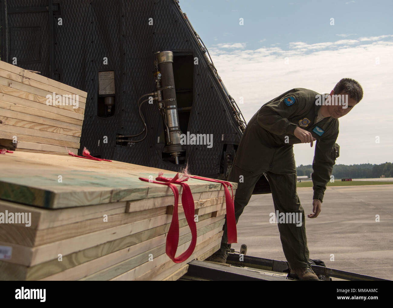 Senior Airman Adrian Diaz, a loadmaster from Westover Air Reserve Base ...