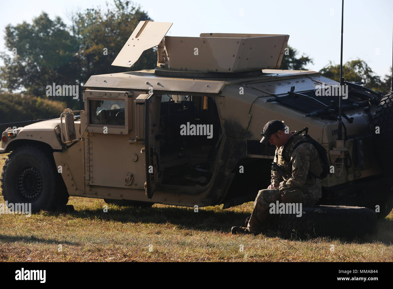 Josh Olson, a member of the Asymmetric Warfare Group, rests during the ...