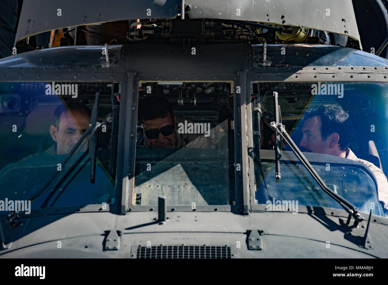 Afghan Mi-17 pilots take a first look at the cockpit of an Afghan Air ...