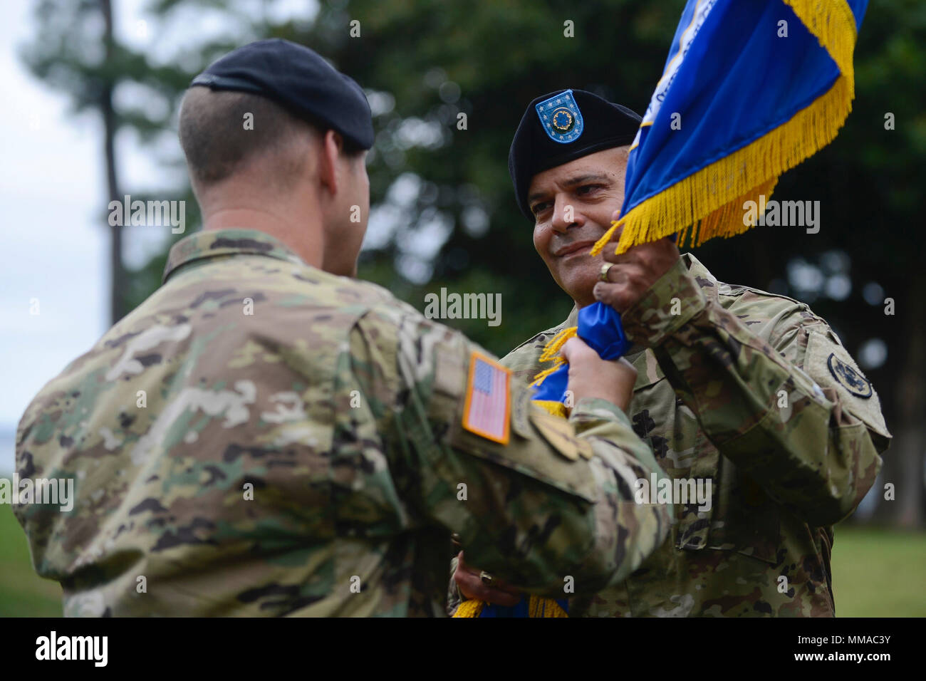 U.S. Army Command Sgt. Maj. Eric J. Vidal I, right, incoming 733rd ...