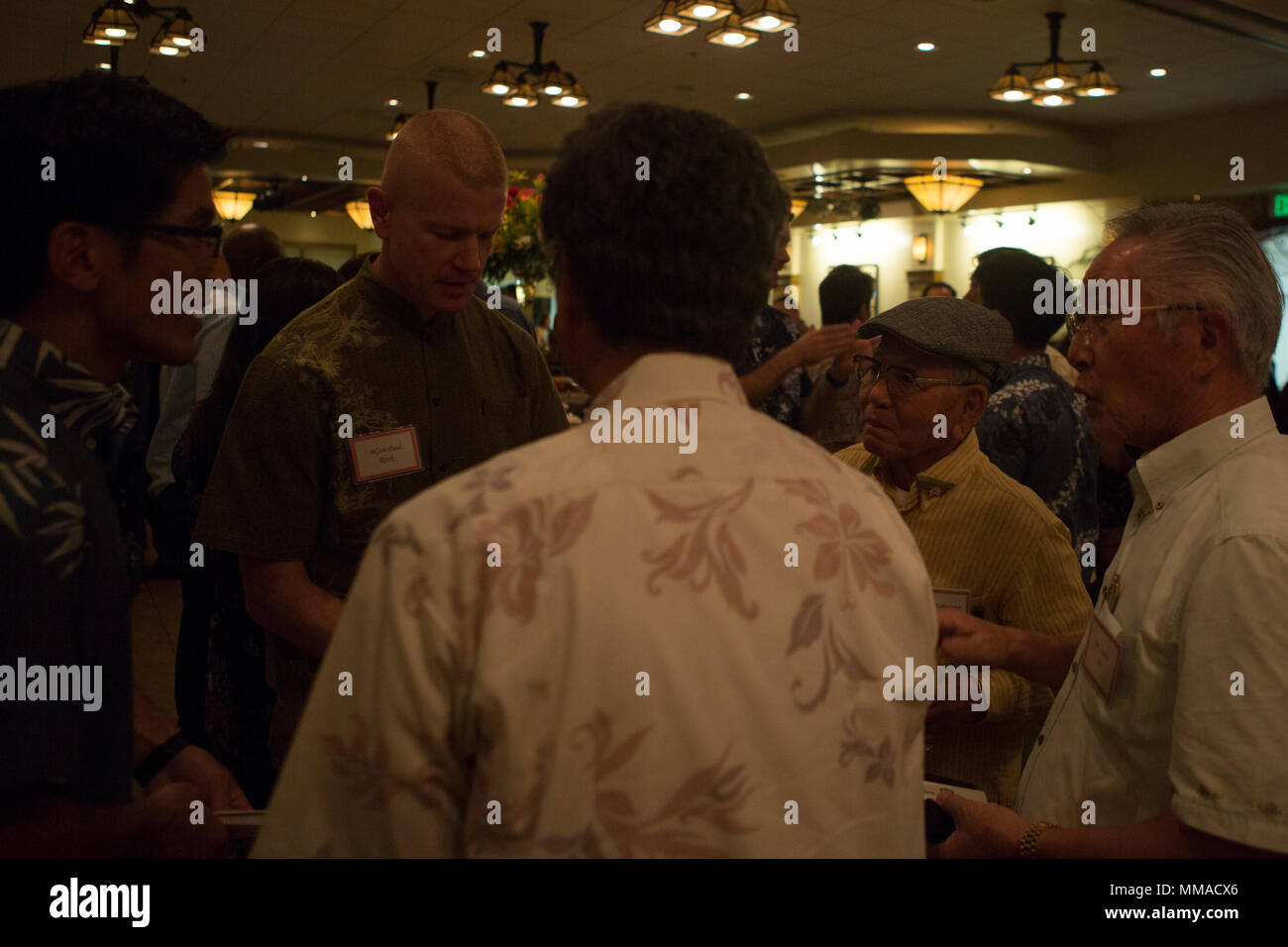 CAMP COURTNEY, OKINAWA, Japan— Brig. Gen. Paul Rock Jr. speaks with ...