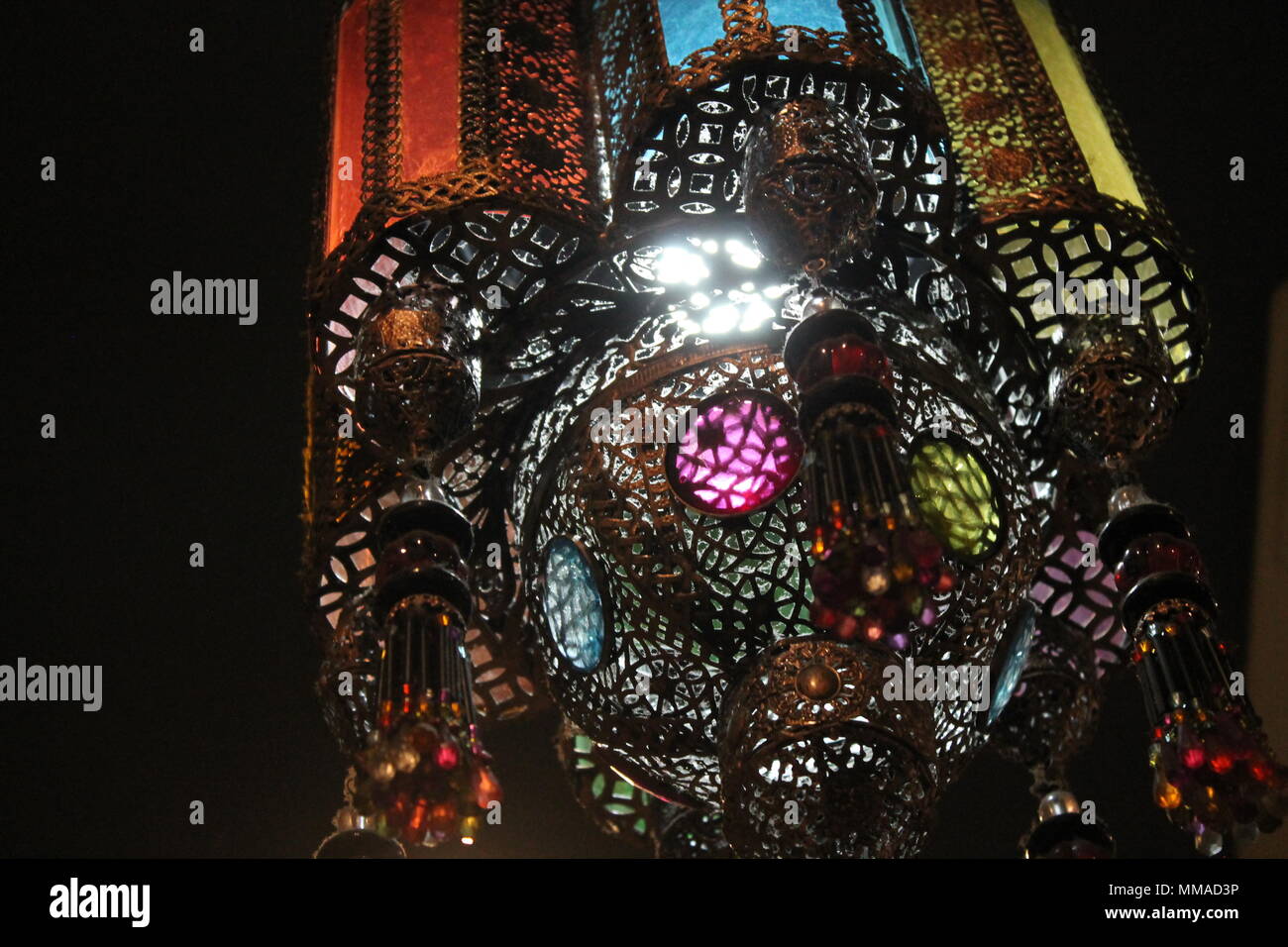 Typical Indian lamp with colored glasses Stock Photo - Alamy