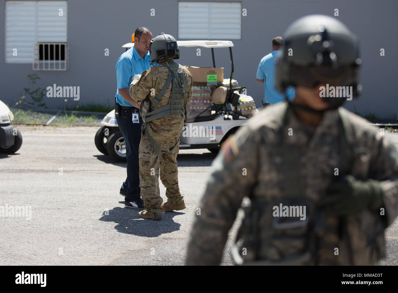 U.S. Army Sgt. Ryan P. Hinojosa (center), assigned to the 101st Combat ...