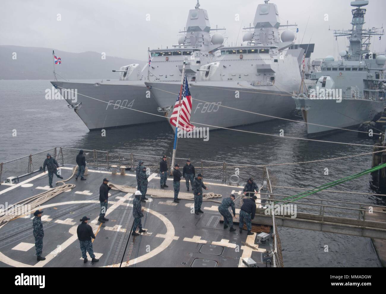 171001-N-WV703-0019 FASLANE, Scotland (Oct. 1, 2017) Sailors raise the ...