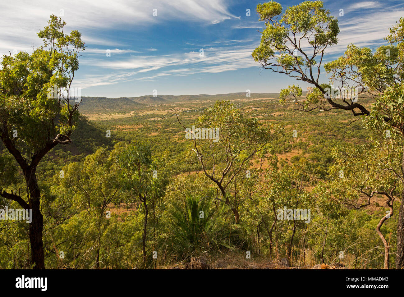 View of vast outback landscape of ranges and plains under blue sky from ...