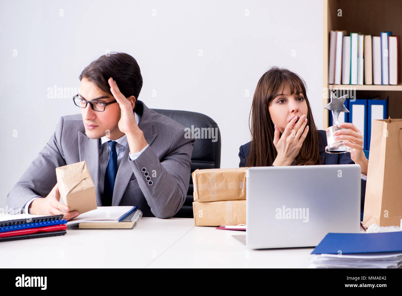 Business people receiving new mail and parcels Stock Photo - Alamy
