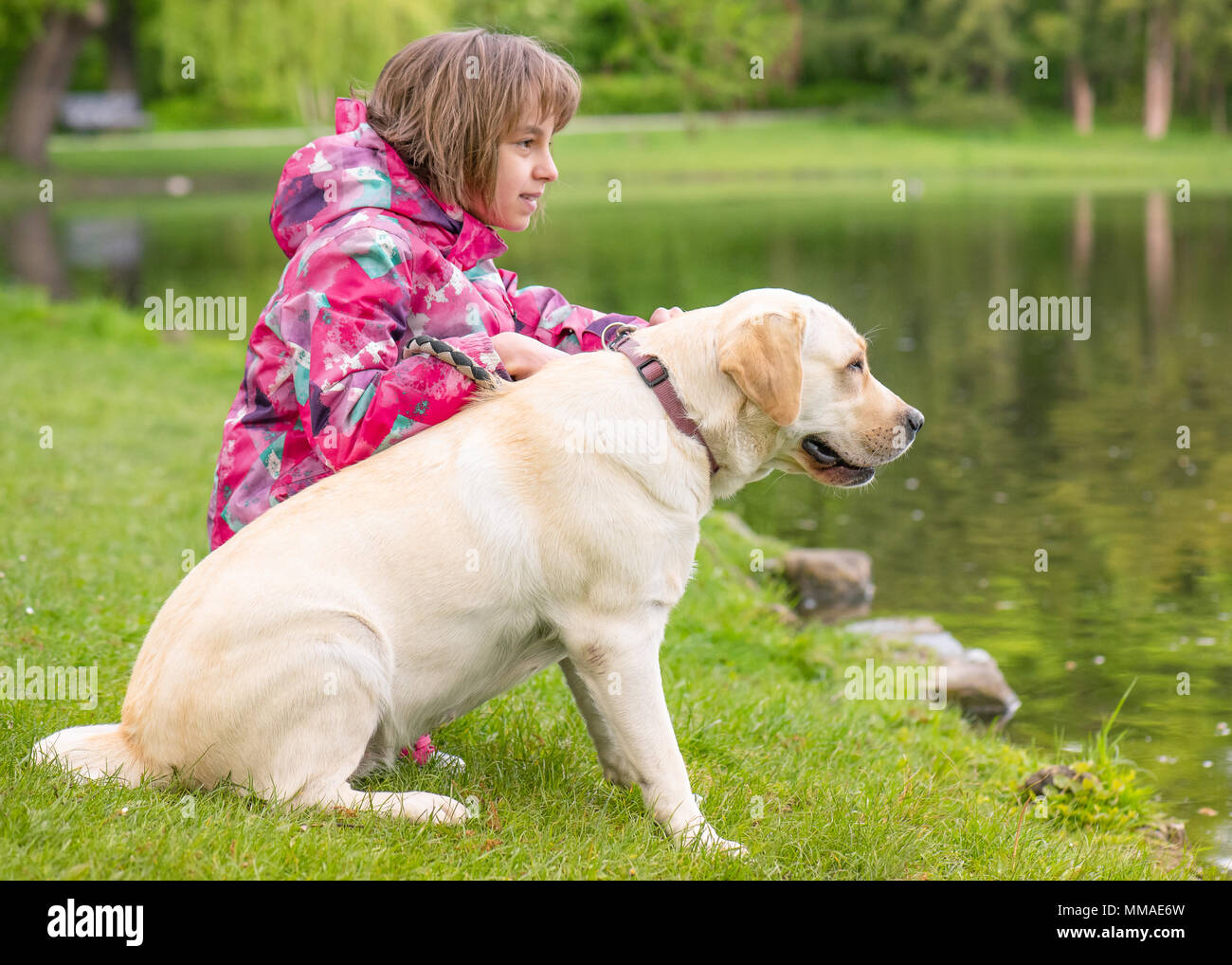 Child with dog hi-res stock photography and images - Alamy