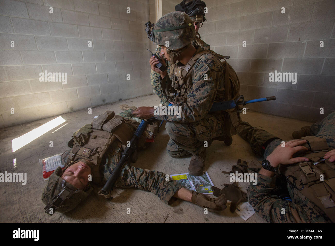 A Marine with 2nd Battalion, 8th Marine Regiment radios for a casualty evacuation during a ...