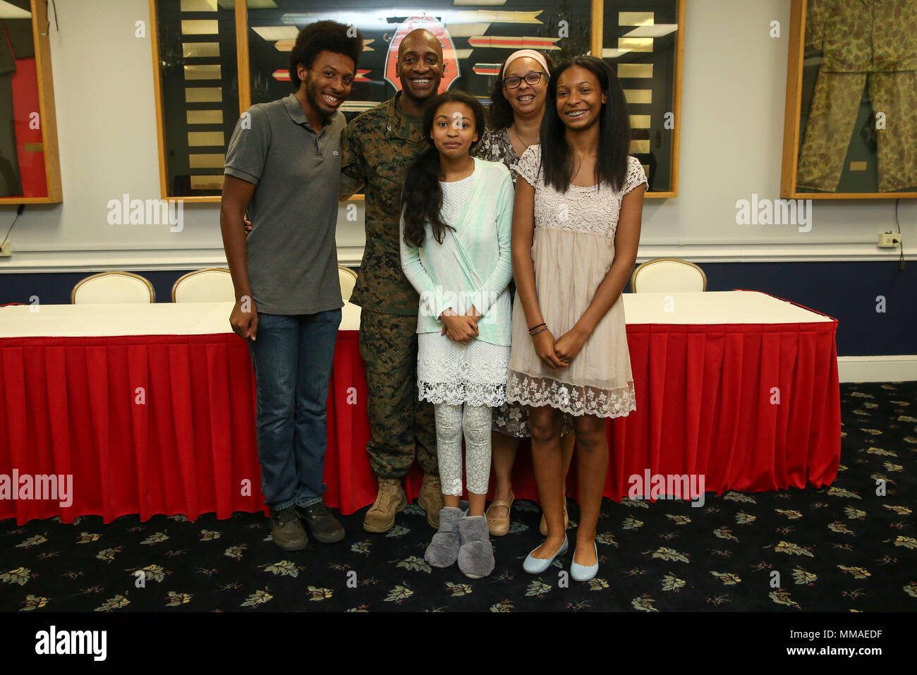 U.S. Marine Corps Col. James Ryans poses with his family following his promotion ceremony on ...