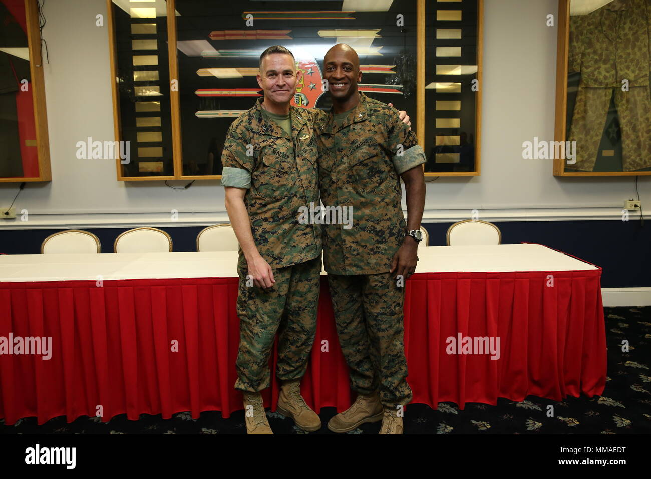 U.S. Marine Corps Col. Jordan Walzer and Col. James Ryans pose together ...