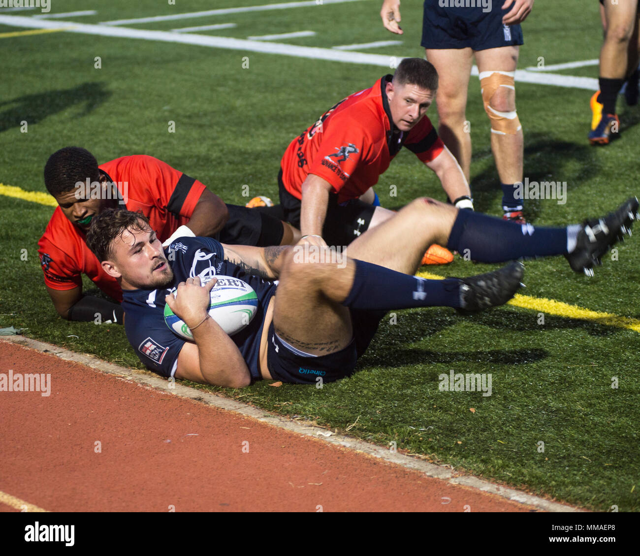 U.S. Marines assigned to the All Marine Rugby Team and Royal Sailors ...