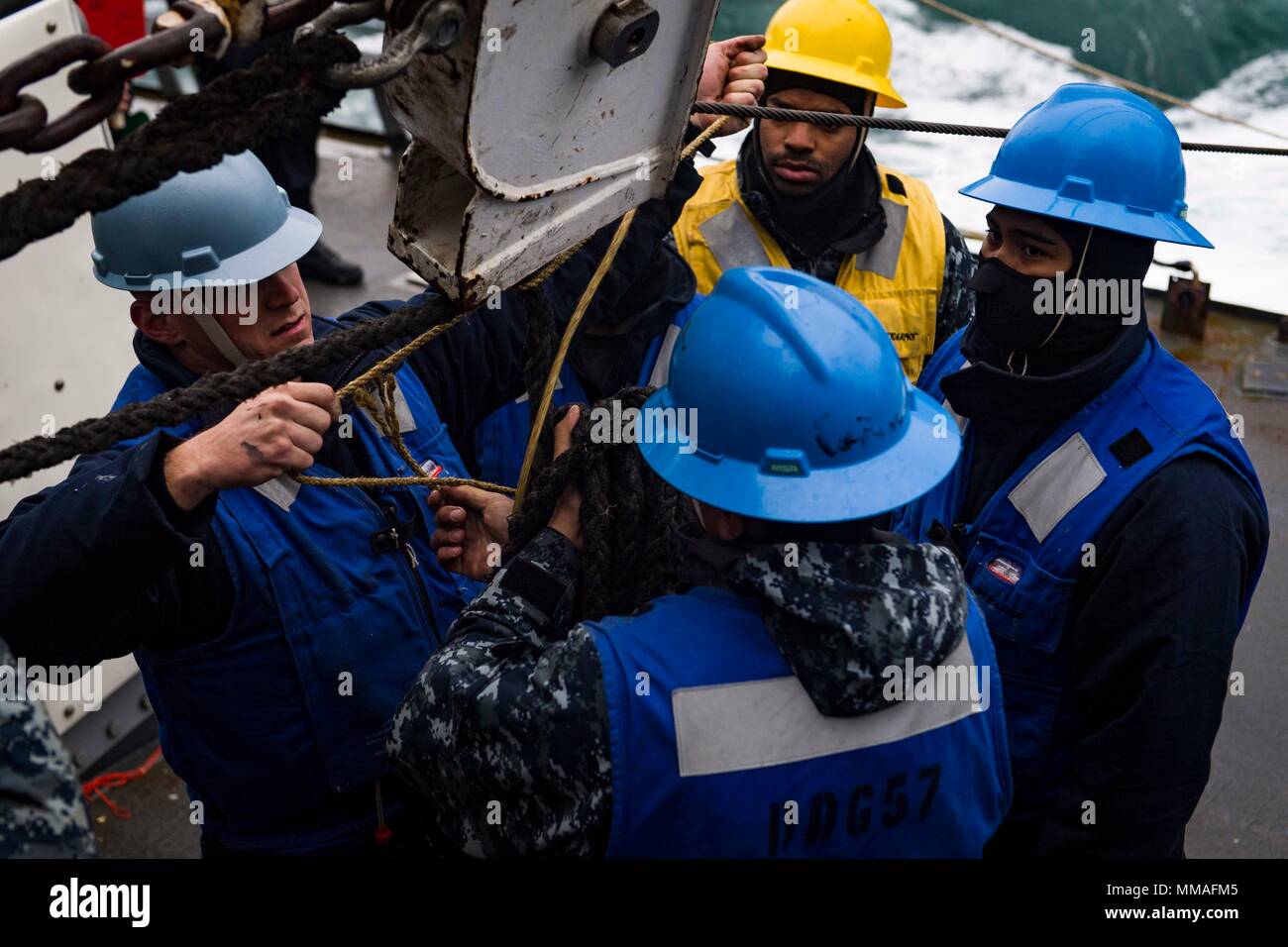 171004-N-EO381-089 IRISH SEA (Oct. 4, 2017) Sailors assigned to the ...