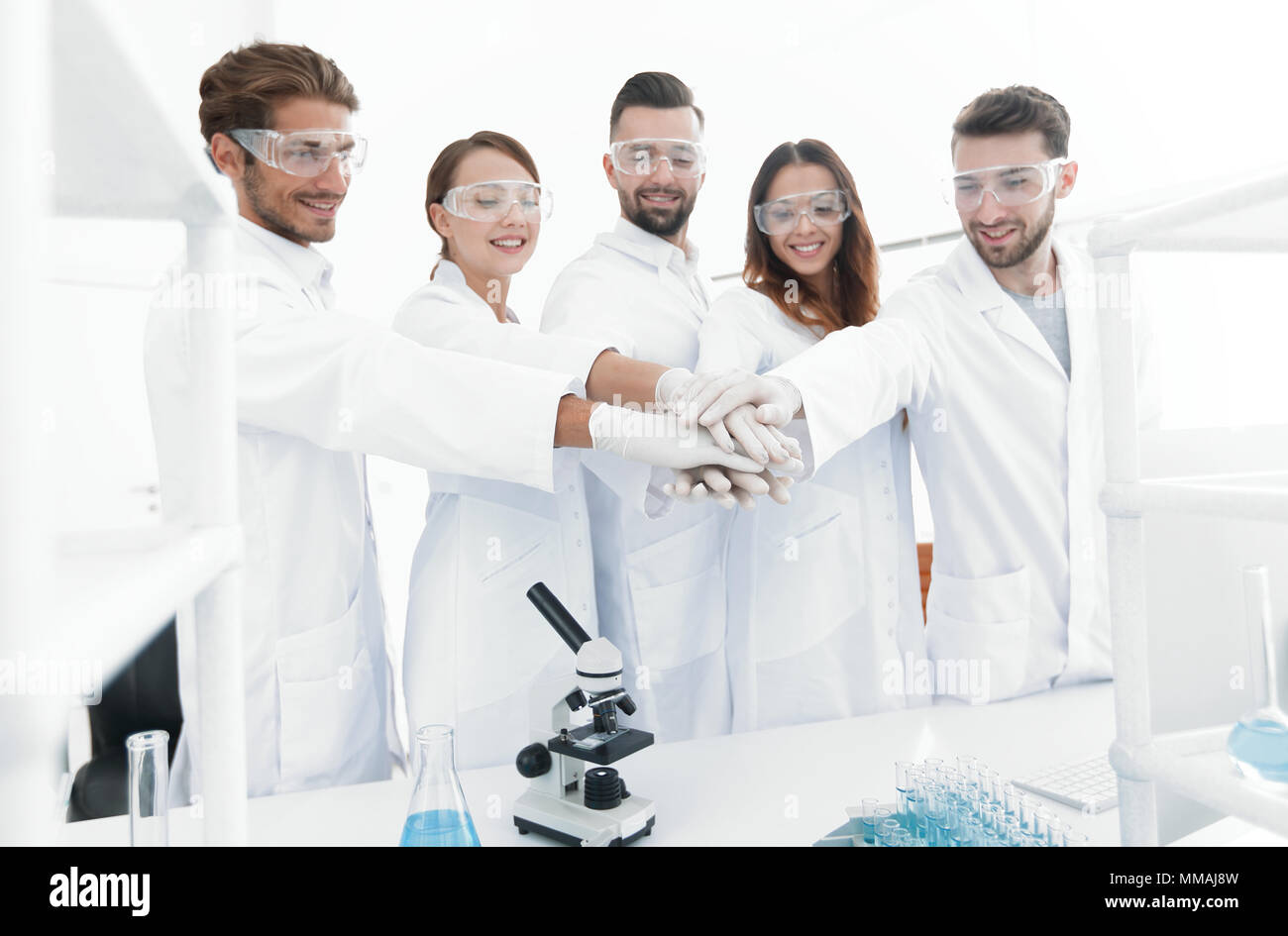 creative team of young scientists Stock Photo - Alamy