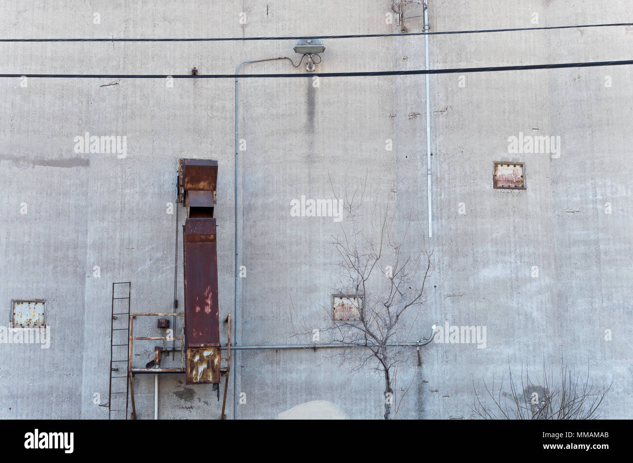 external wall of grain storage silo and chute Stock Photo - Alamy