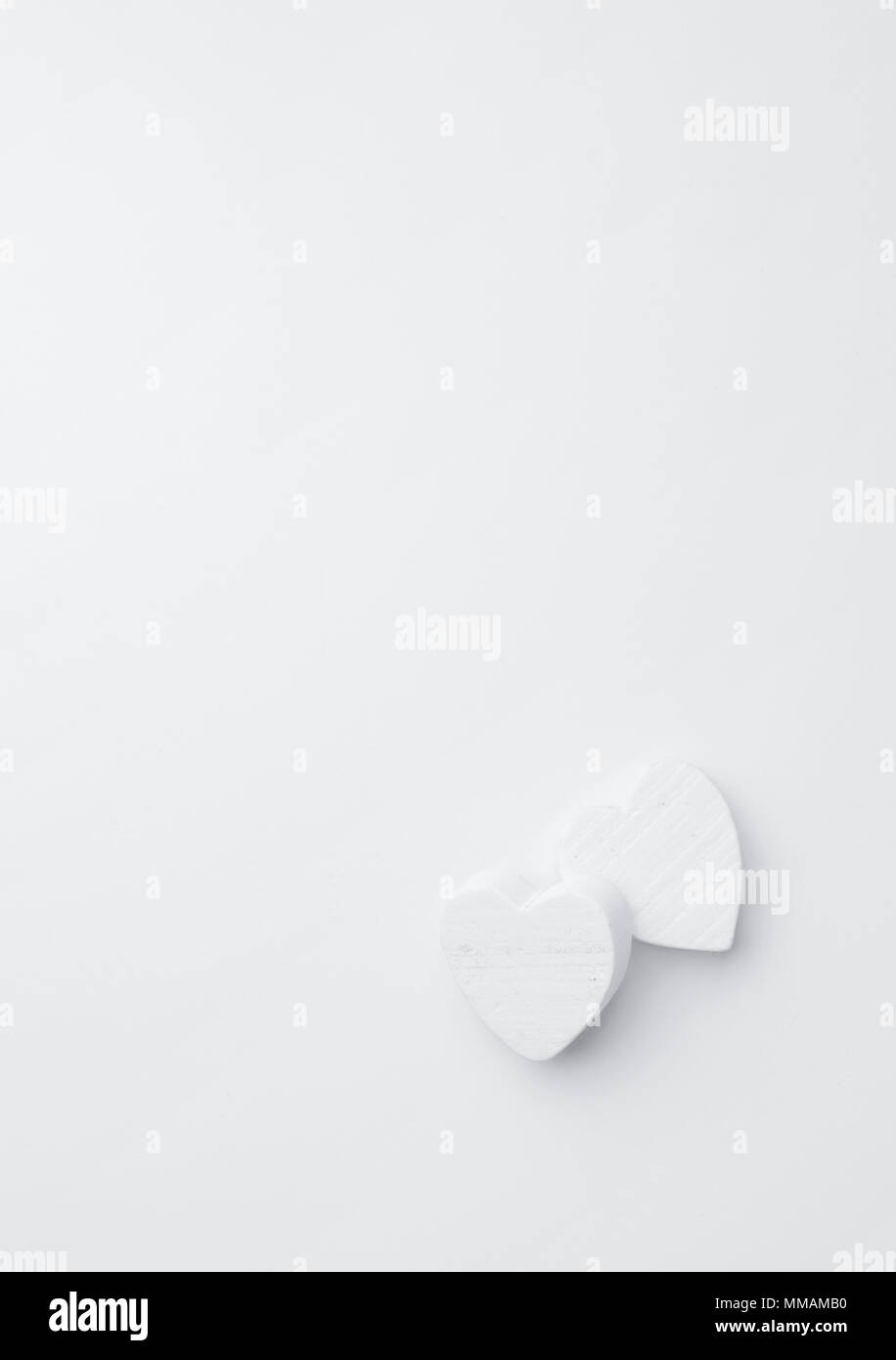 Background: Two hearts over white background, top view with negative ...