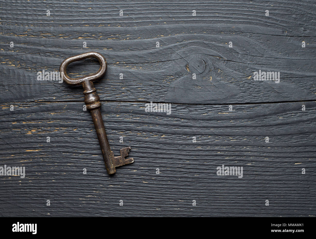 Vintage Key over dark wooden table, top view with negative space Stock ...