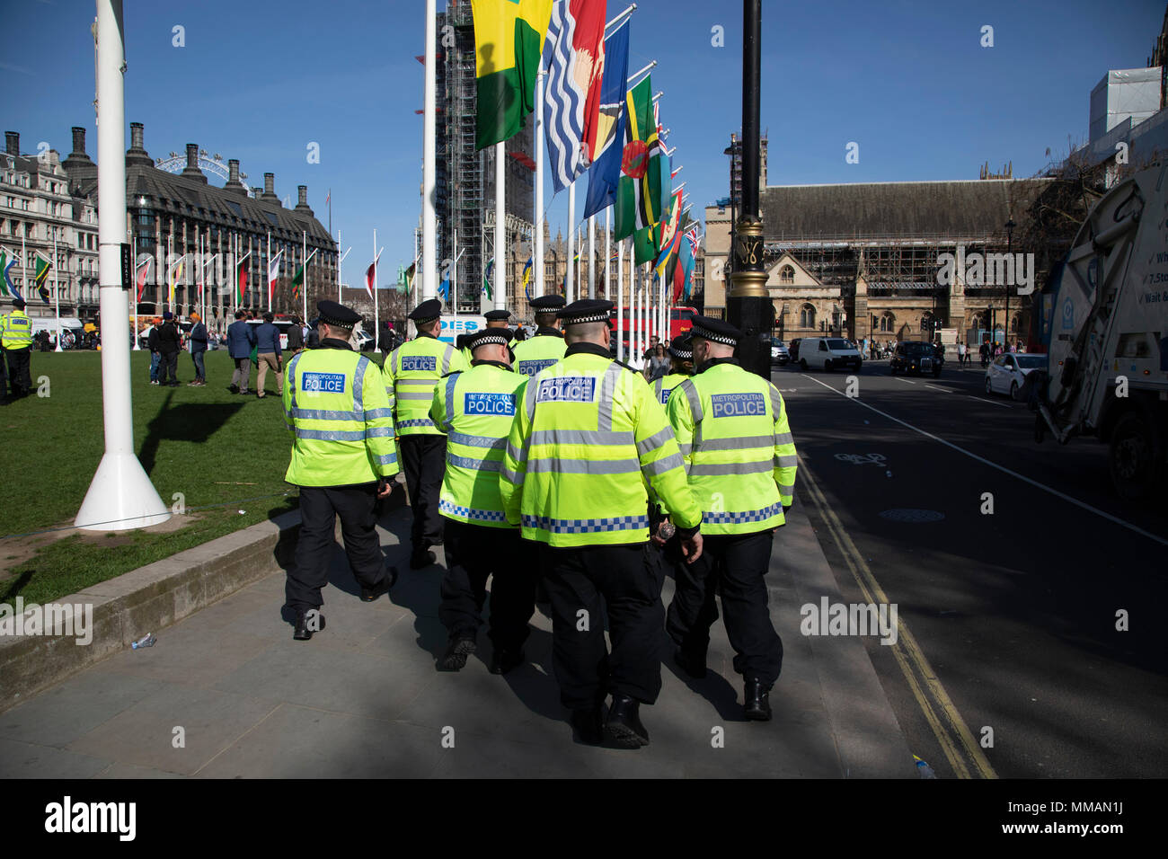 Police presence underneath flags of the Commonwealth flying to ...