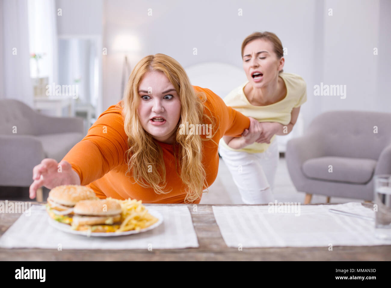 Woman overwhelmed food hi-res stock photography and images - Alamy